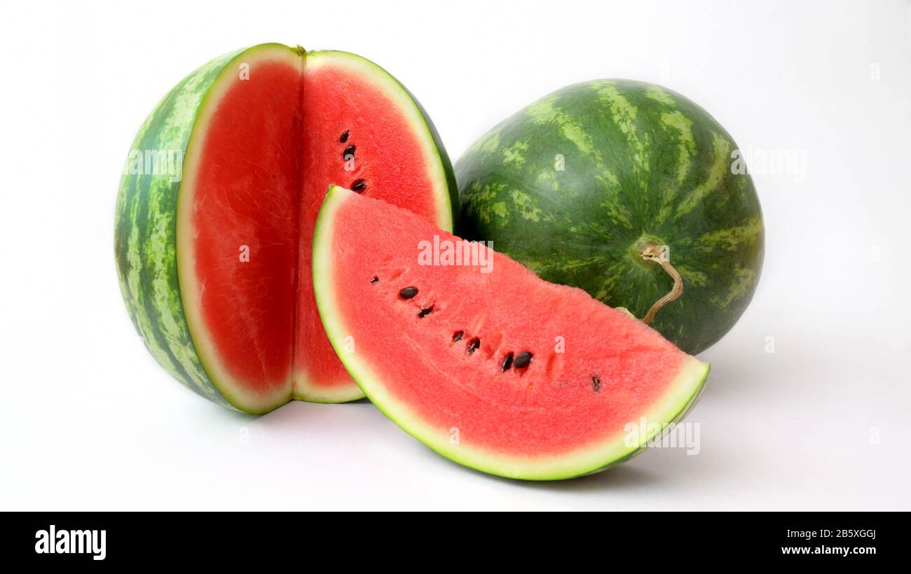 Close up view of whole and sliced ripe watermelon, tropical fruit ...
