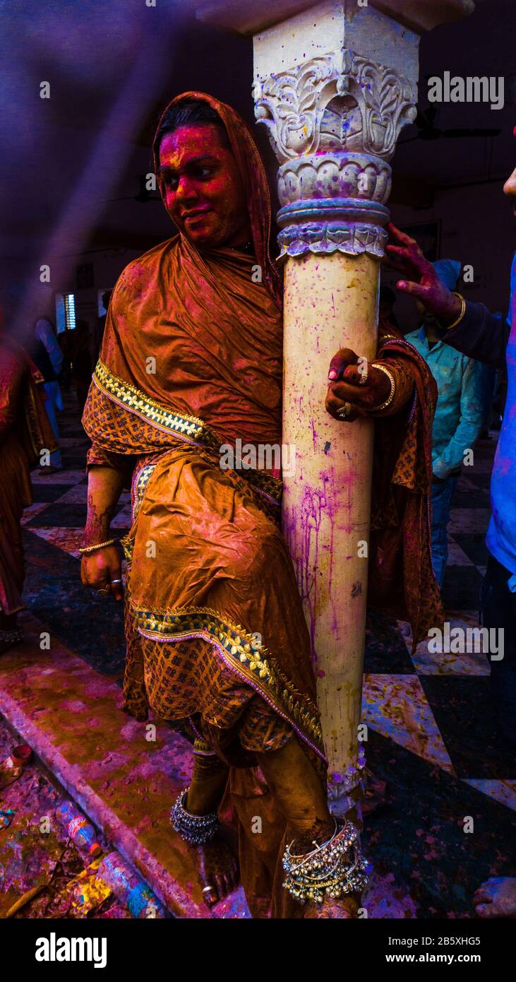 transgender holi in Mathura holi festival. People dancing and playing ...