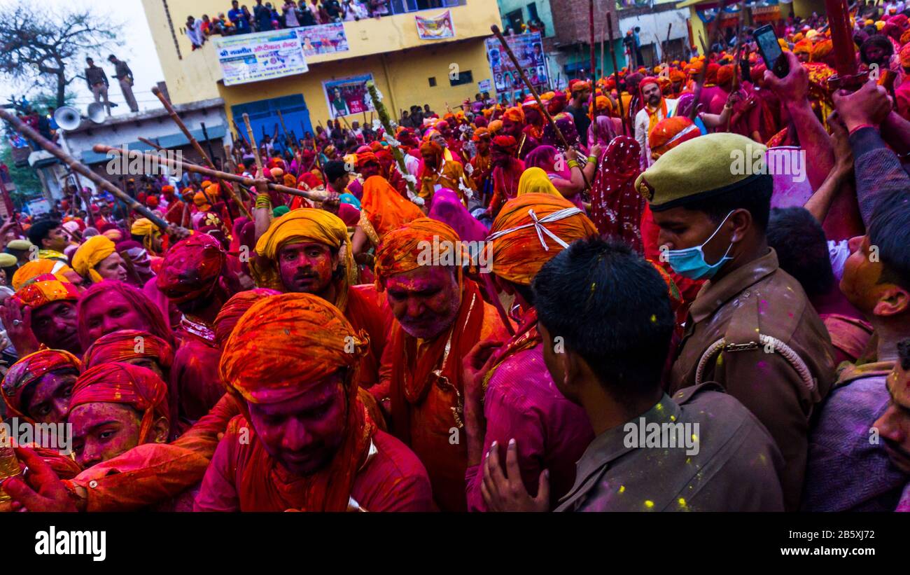 People celebrating lathmar holi in nand gaon Stock Photo - Alamy