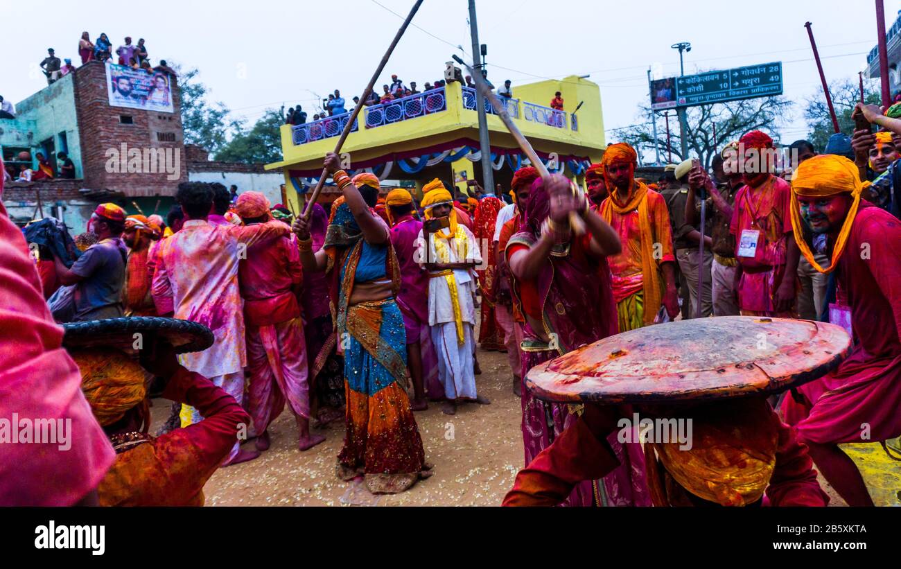People celebrating lathmar holi in nand gaon Stock Photo - Alamy
