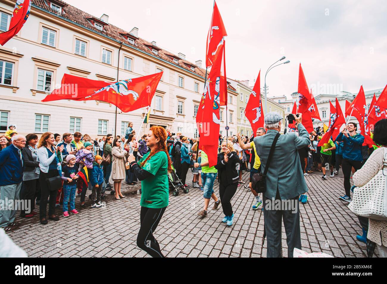 Vilnius, Lithuania. Sportsmen With Flag Take Part In Statehood Day On ...