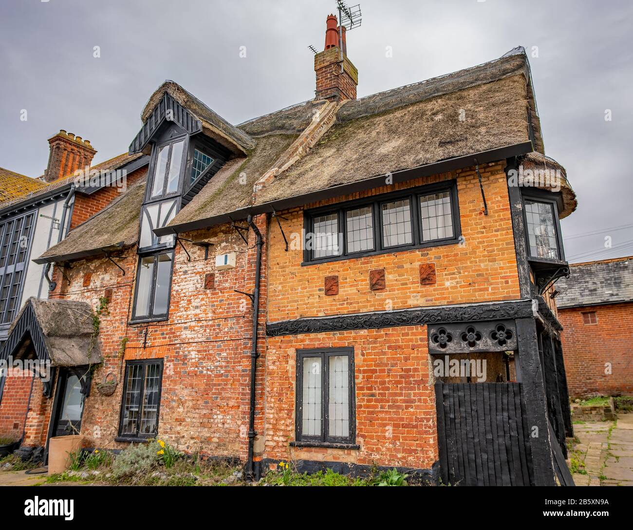 7 Horning, Norfolk, UK – March 07 2020. Norfolk red brick building with ...