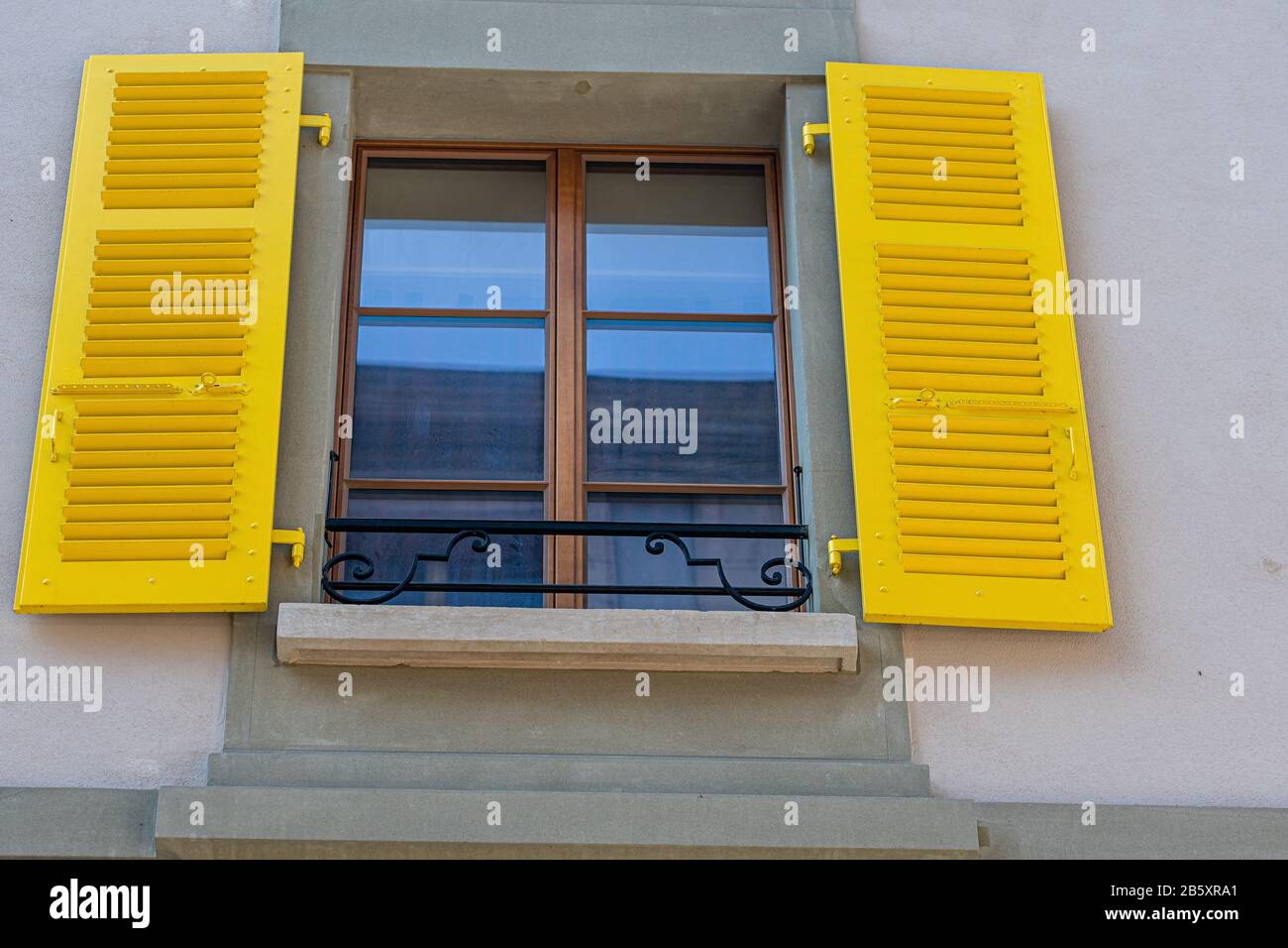 Windows with different color shutters. Geneva, Switzerland - image ...