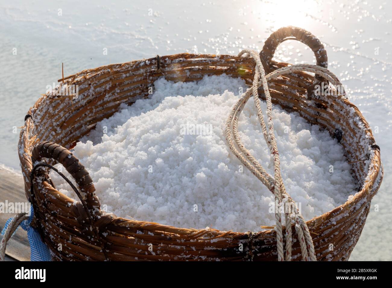 A Filled Basket of salt waiting to be taken to the storage hut during ...