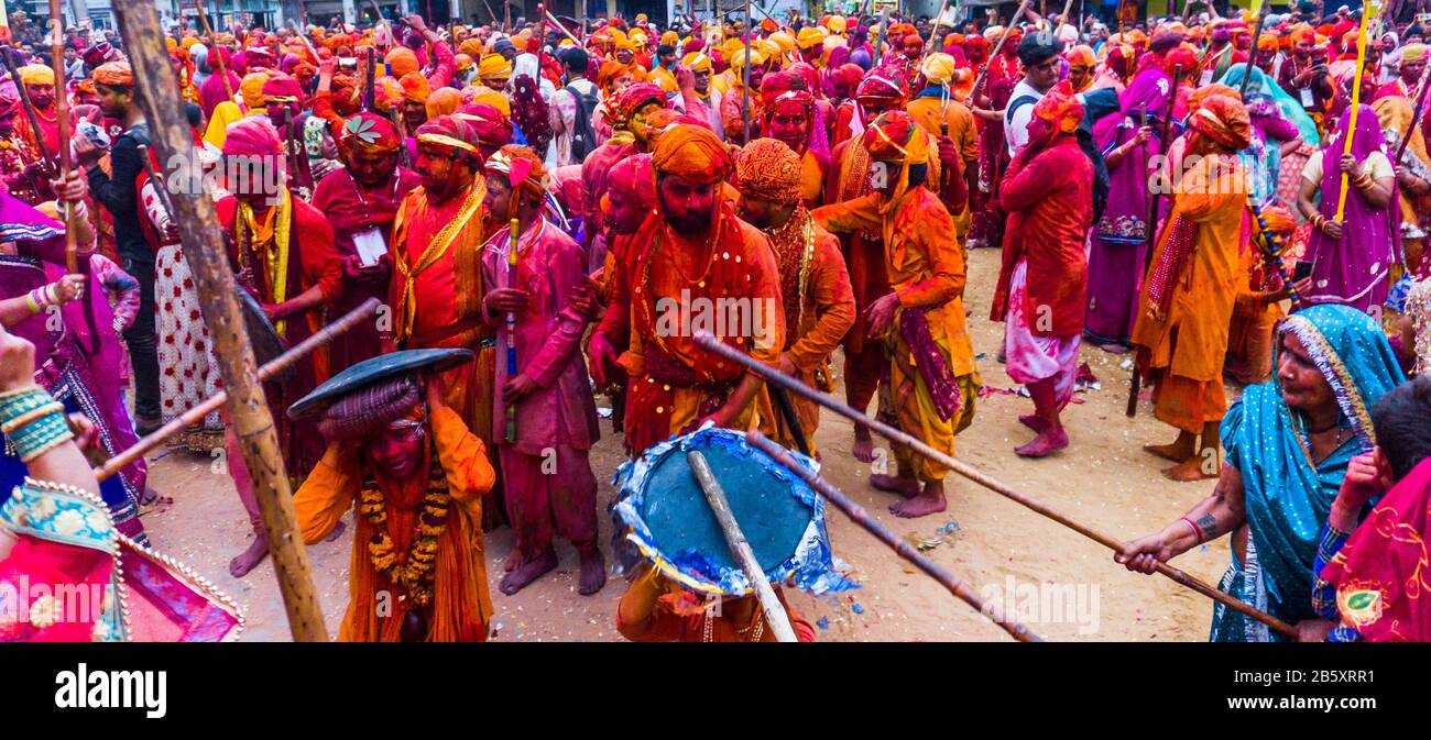 People celebrating lathmar holi in nand gaon Stock Photo - Alamy
