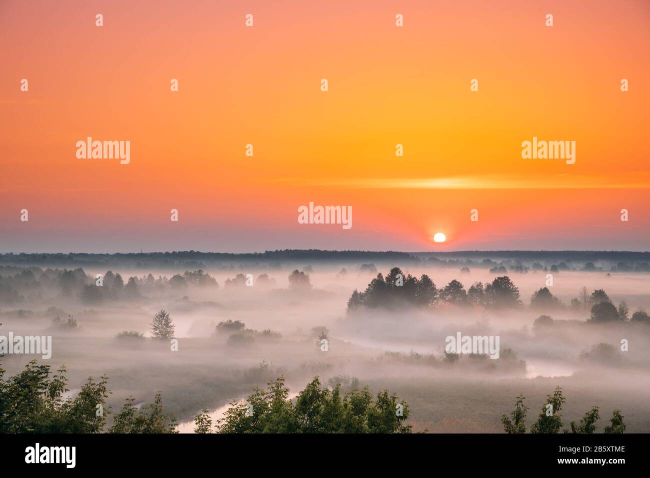 Amazing Sunrise Sunset Over Misty Landscape. Scenic View Of Foggy ...
