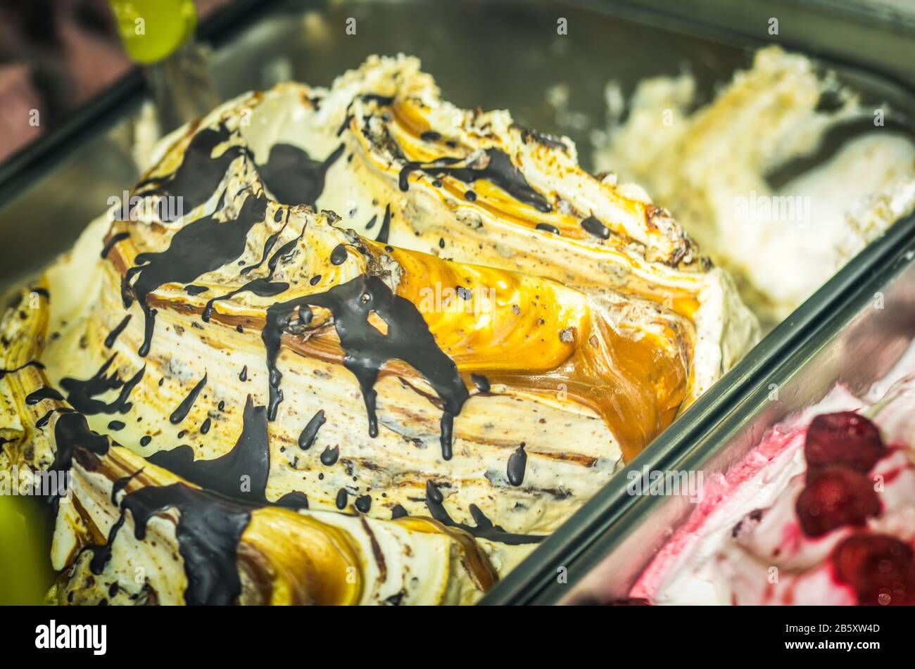 delicious italian ice cream with fresh fruits, nuts & topping Stock ...