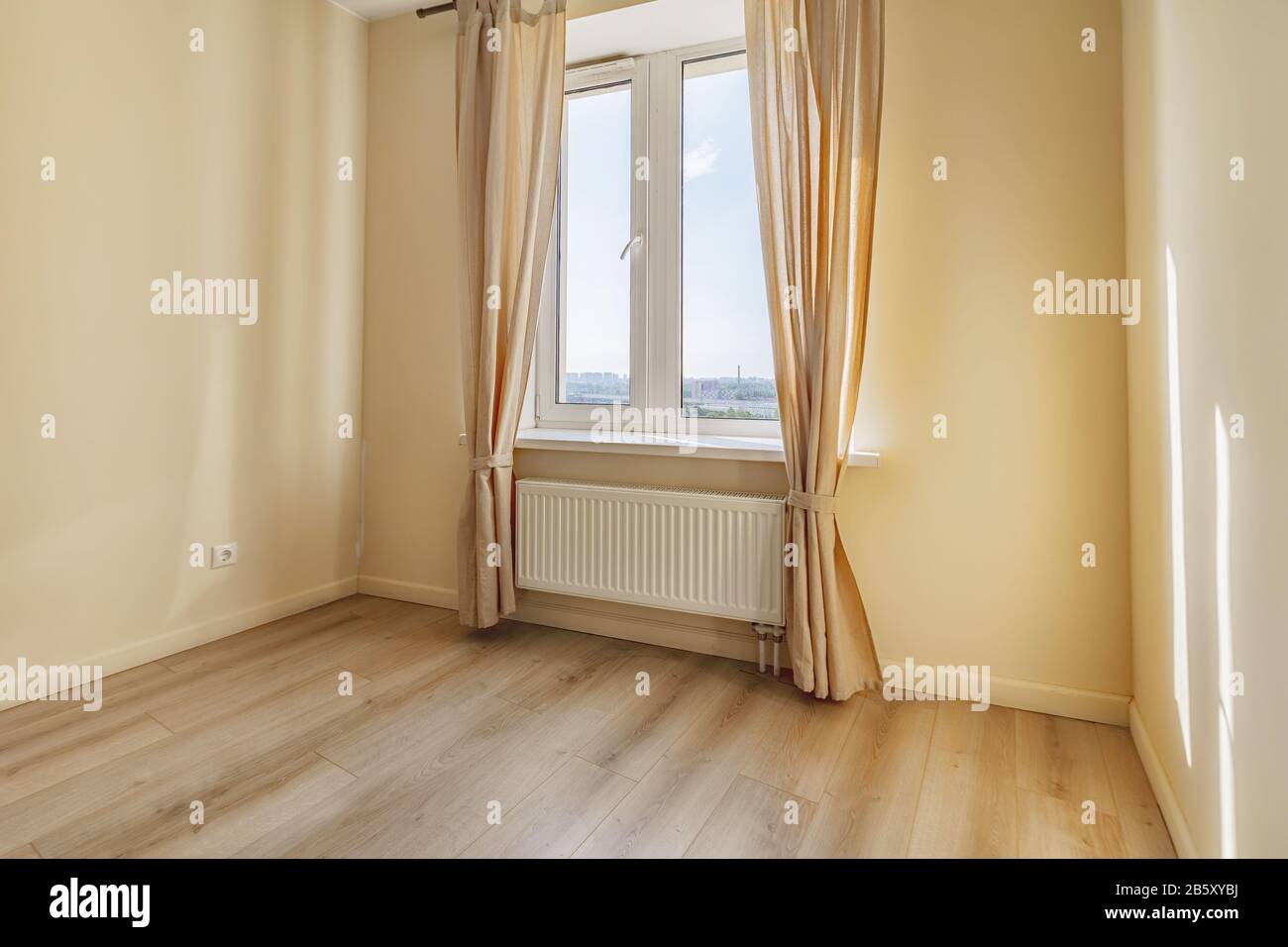 Open window with curtains in empty beige apartment sunny morning Stock ...