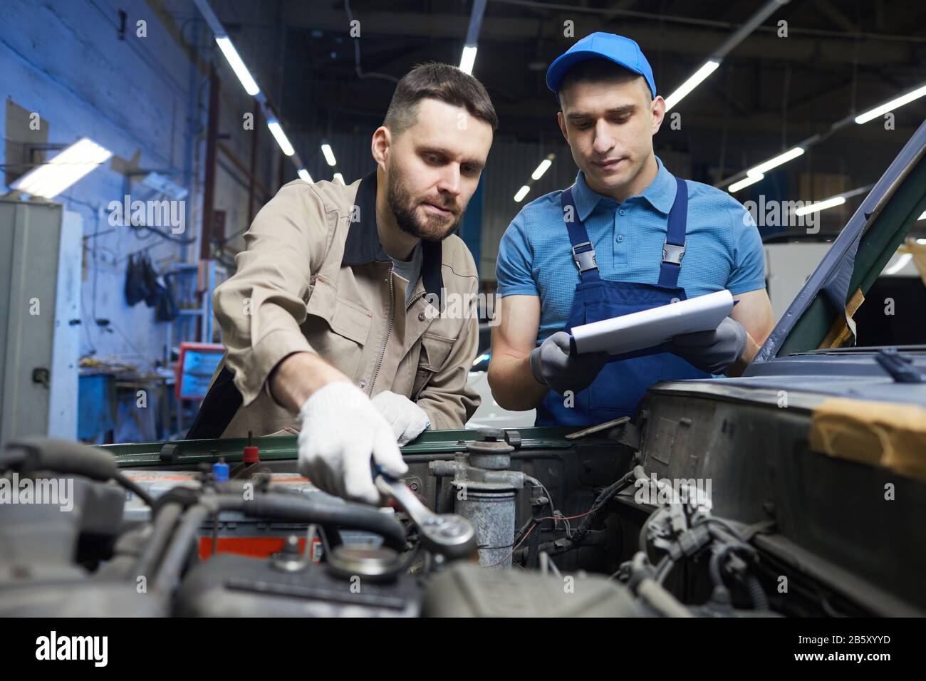 Horizontal medium portrait of young adult Caucasian men wearing uniform ...