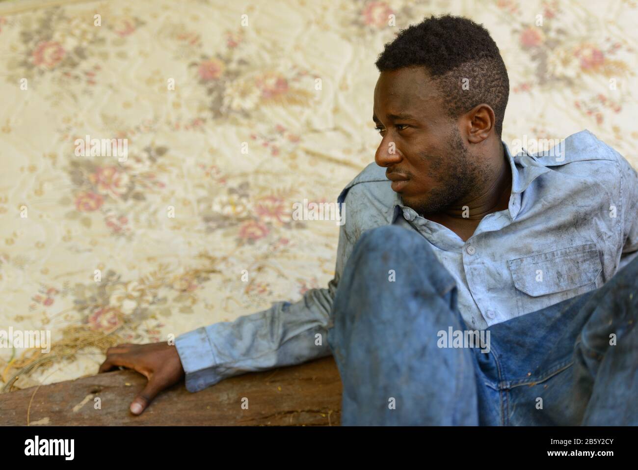 Young homeless African man in the streets Stock Photo - Alamy