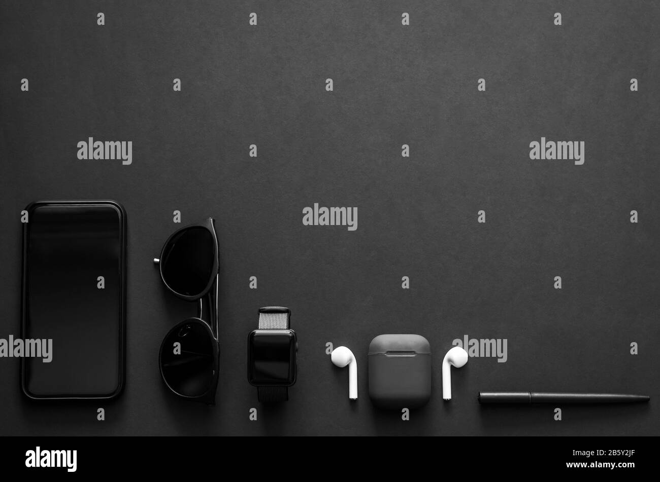 Men gadgets in modern lifestyle on dark background for minimalist flat ...