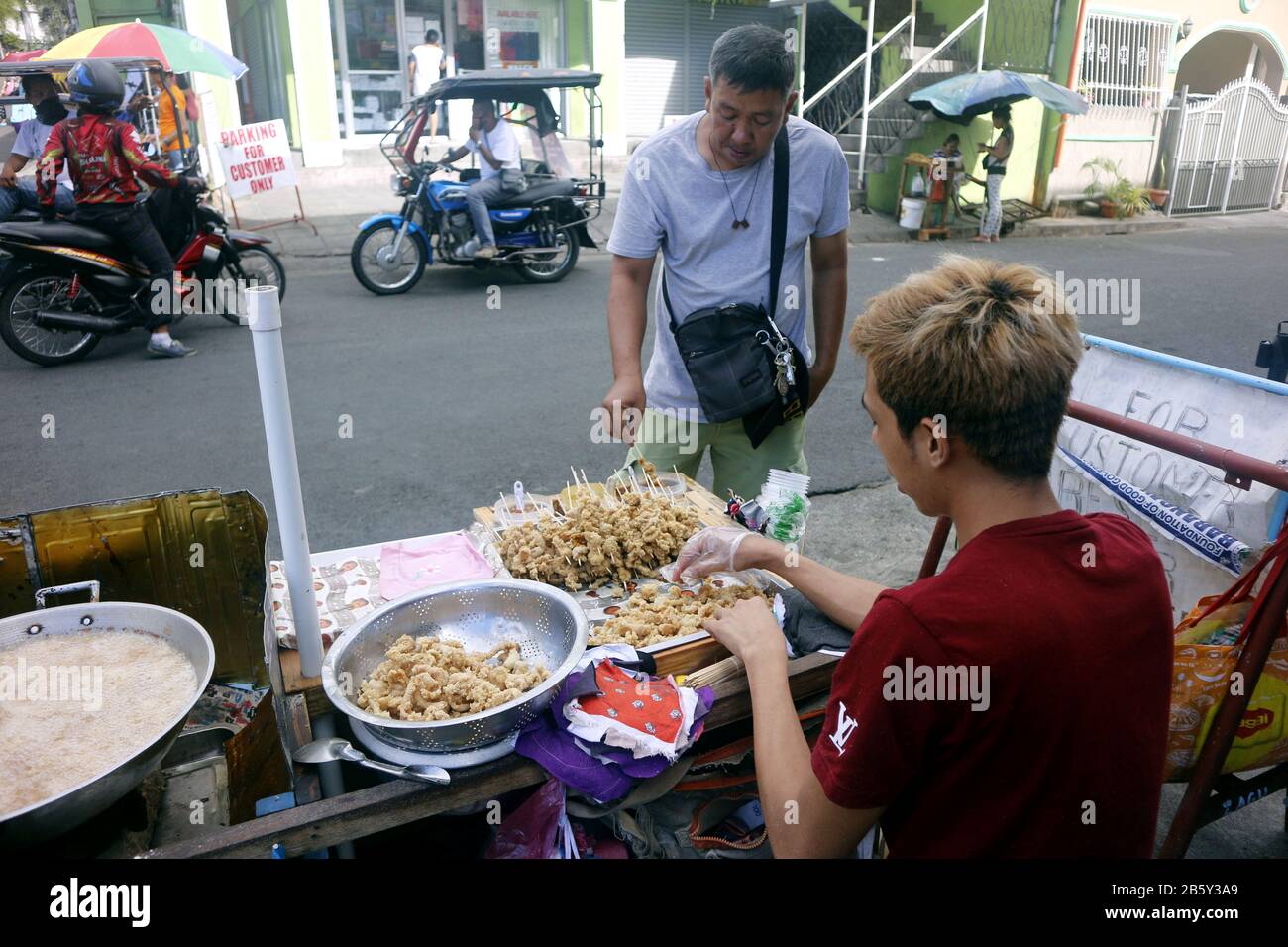 Antipolo, Rizal, Philippines - February 28, 2020: Street food vendor at ...