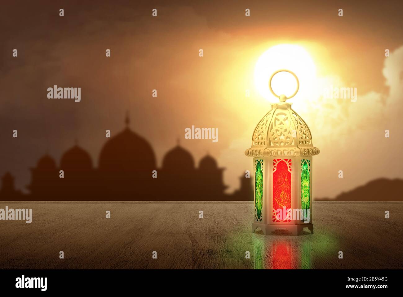 Arabic lamp with colorful light with a sunset sky background Stock ...