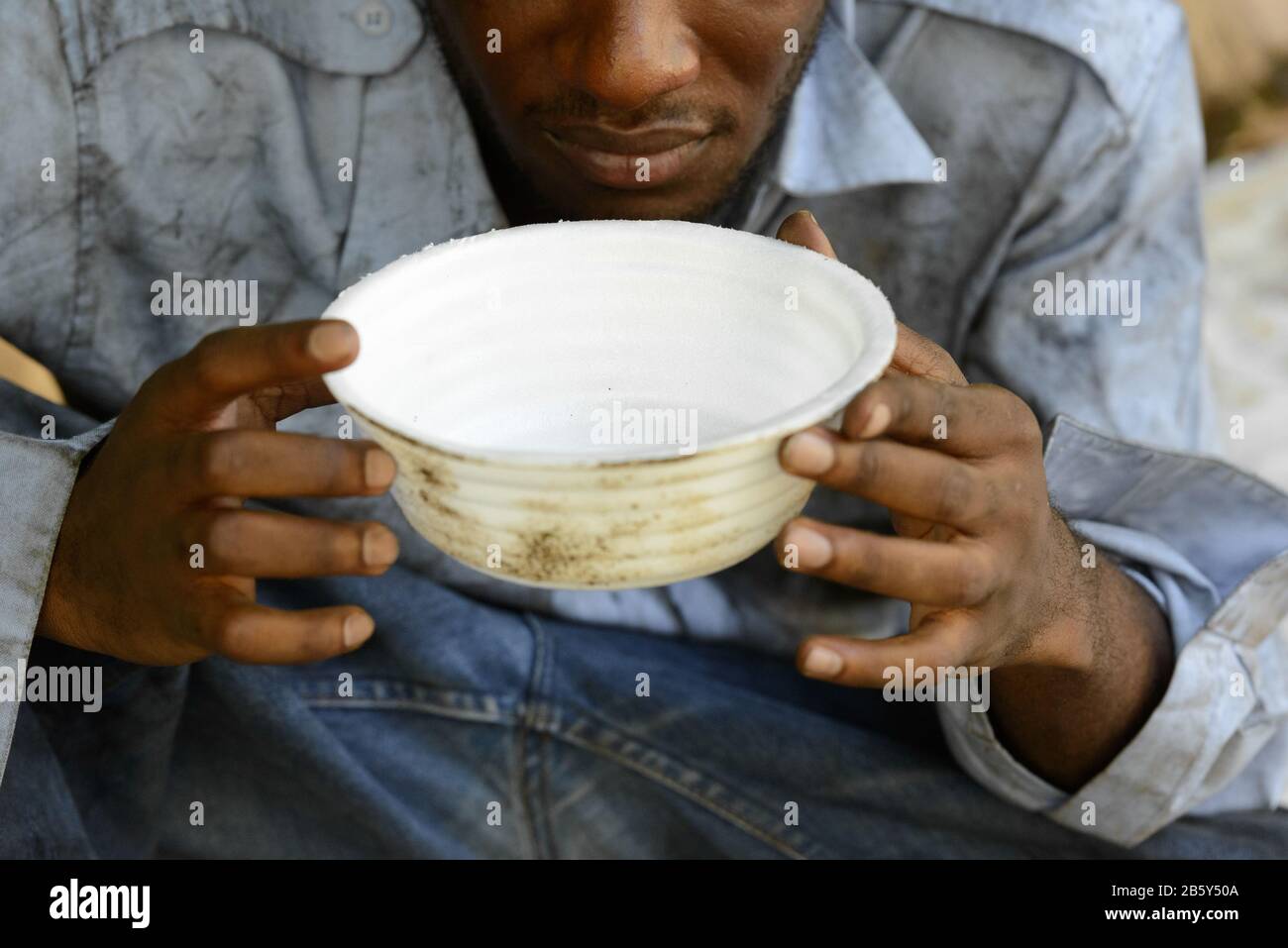 Homeless Black Man Food High Resolution Stock Photography and Images ...