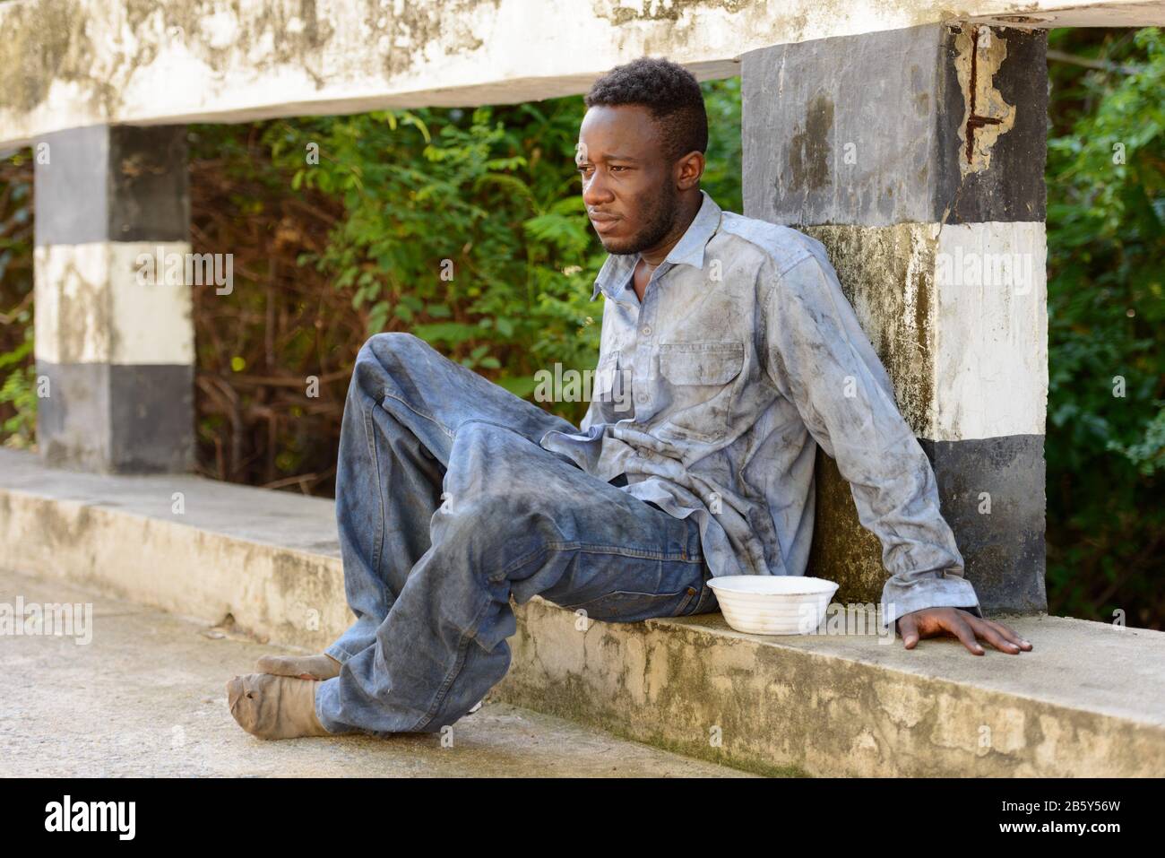 Homeless black man hungry hi-res stock photography and images - Alamy