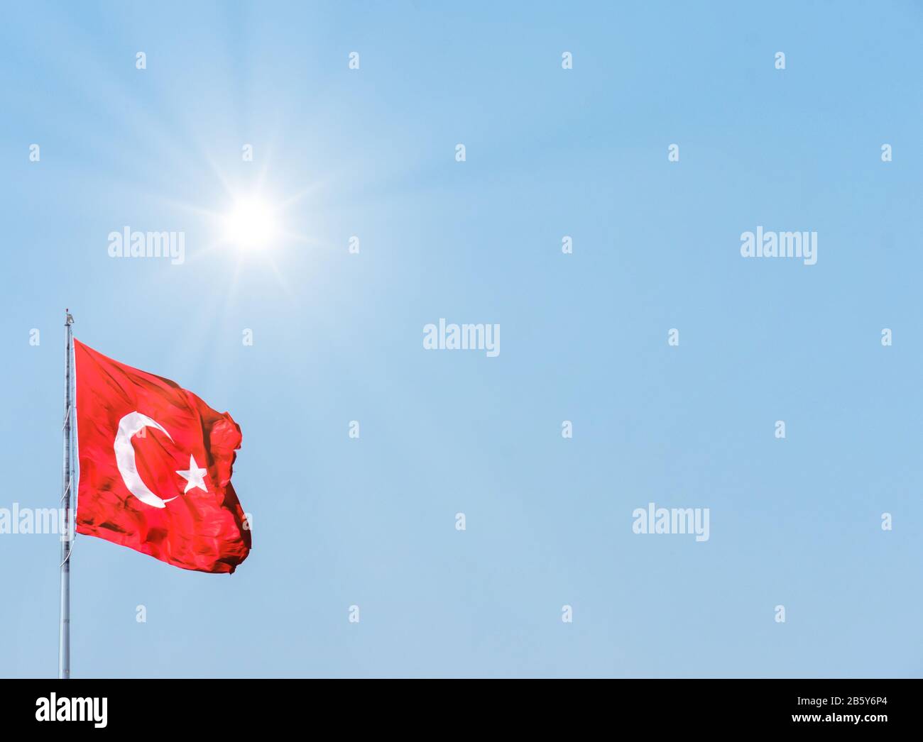 Turkish flag waving front of sun. Background Stock Photo - Alamy