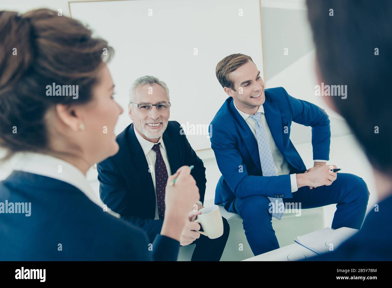 Friendly business team having hi-res stock photography and images - Alamy