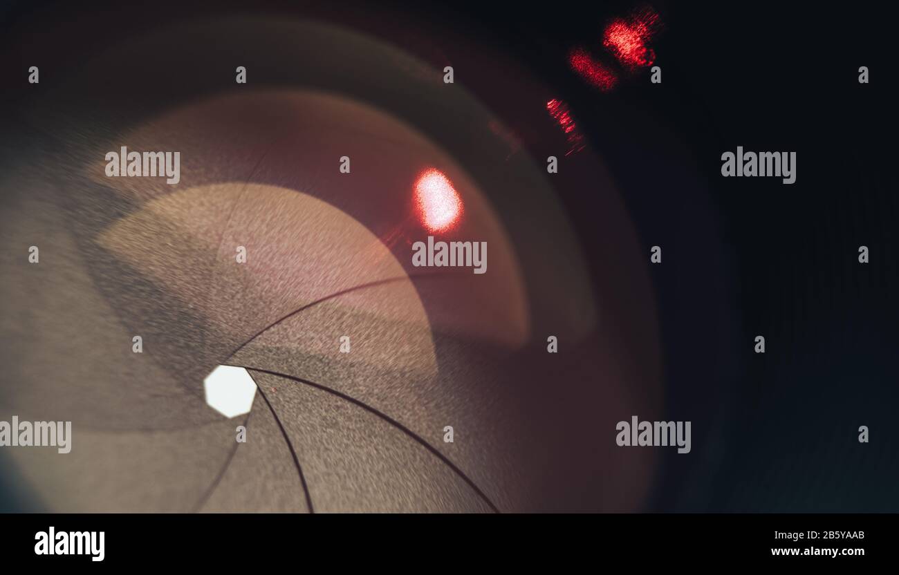 Beautiful camera lens with orange light of glass. Background pattern ...