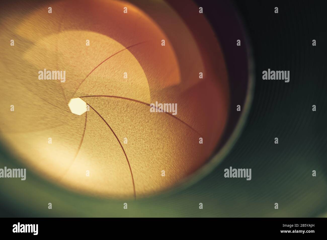 Beautiful camera lens with orange light of glass. Background pattern ...