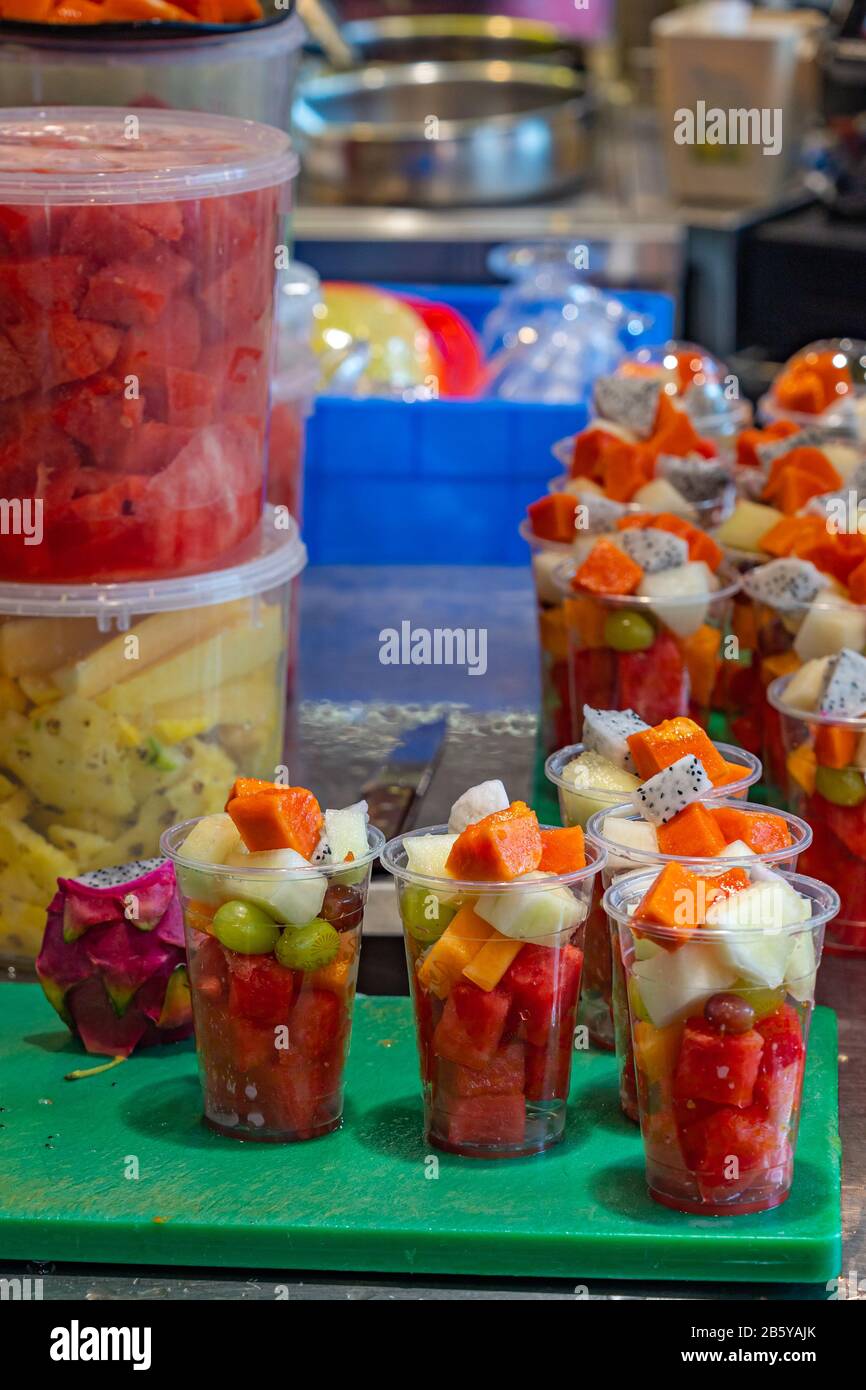Delicious mixed fruit cups for sale in dessert fruit stall Stock Photo ...