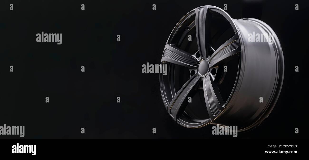 beautiful matte alloy wheels close -up on a dark background. Black and ...