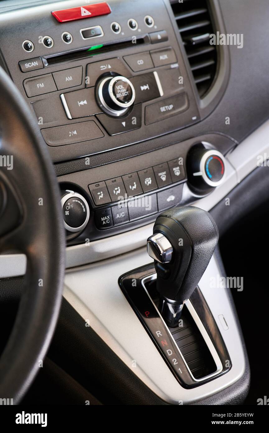 Automatic gear stick of modern car with button on dashboard Stock Photo ...