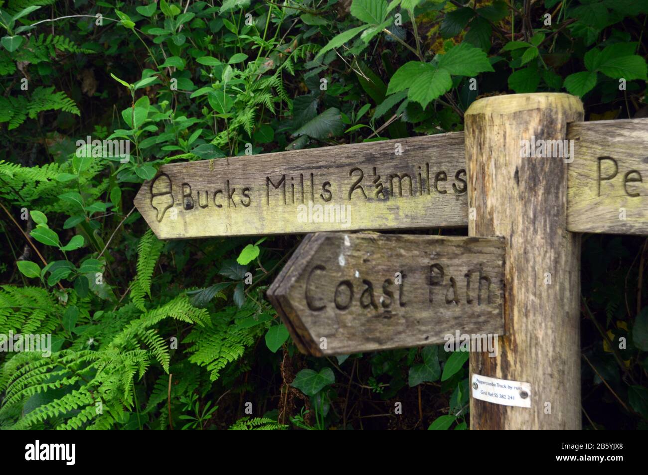 Wooden National Trust Signpost for Buck's Mills & Peppercombe in Sloo ...