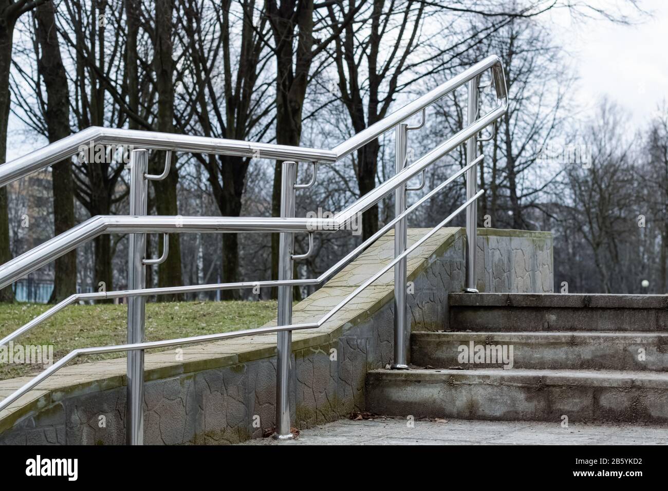 Metal railing stairs in the park close up Stock Photo - Alamy