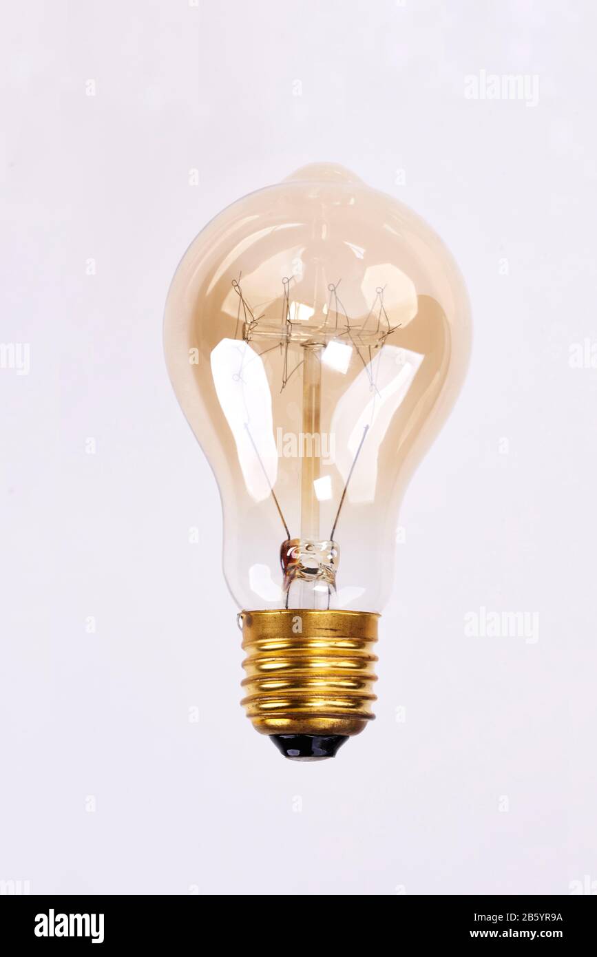 Light bulb on white background Stock Photo - Alamy