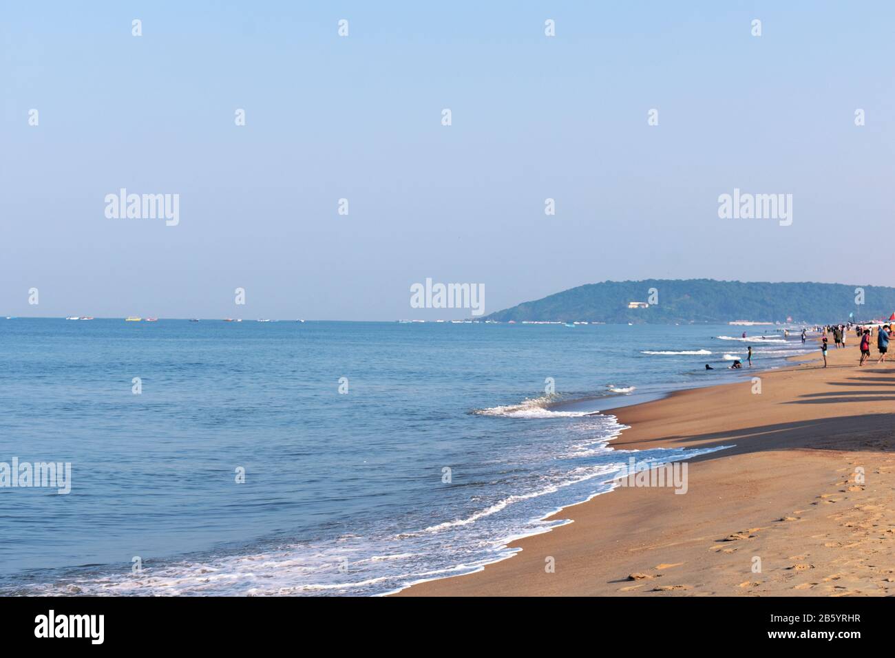 sea beach with small waves in goa Stock Photo - Alamy