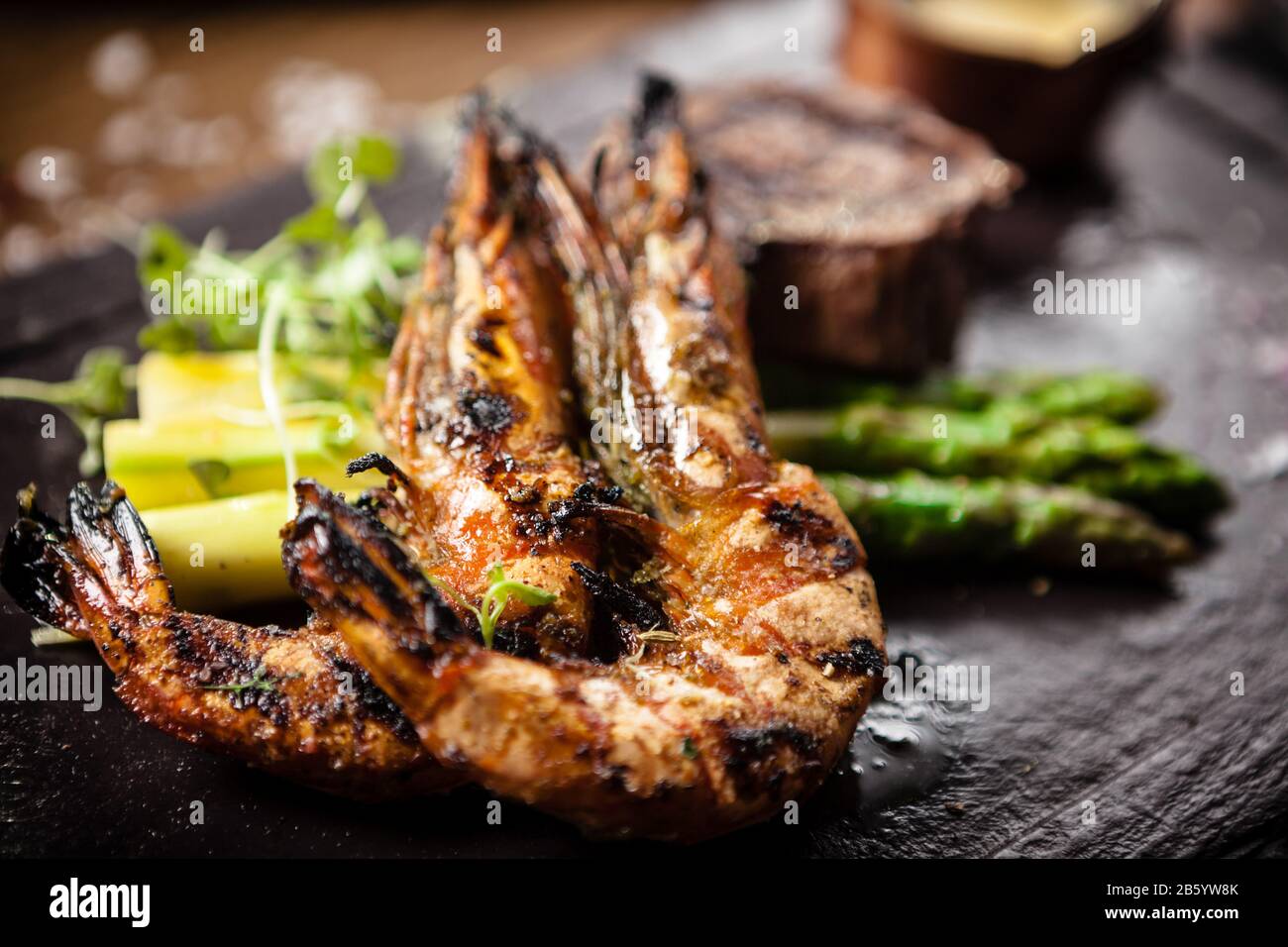 Surf and turf steak tomato prawns hi-res stock photography and images ...