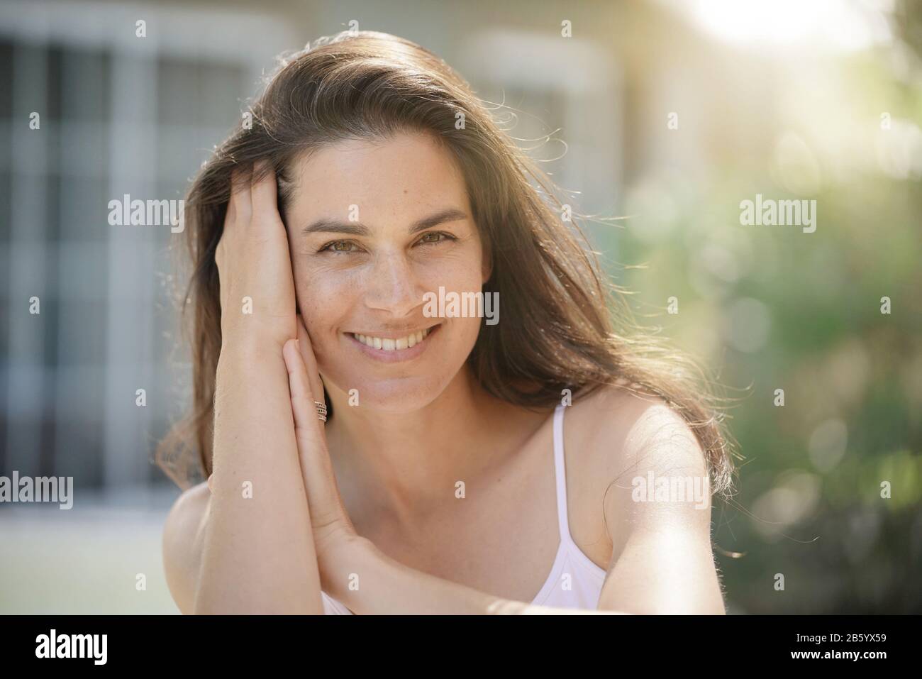Portrait of attractive 40-year-old brunette woman Stock Photo - Alamy
