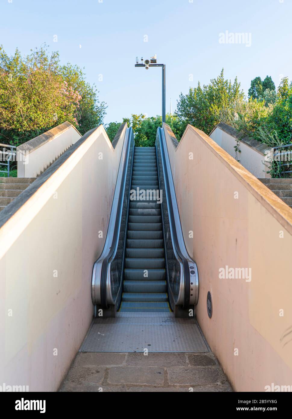 City outdoor escalator with motion sensor Stock Photo - Alamy