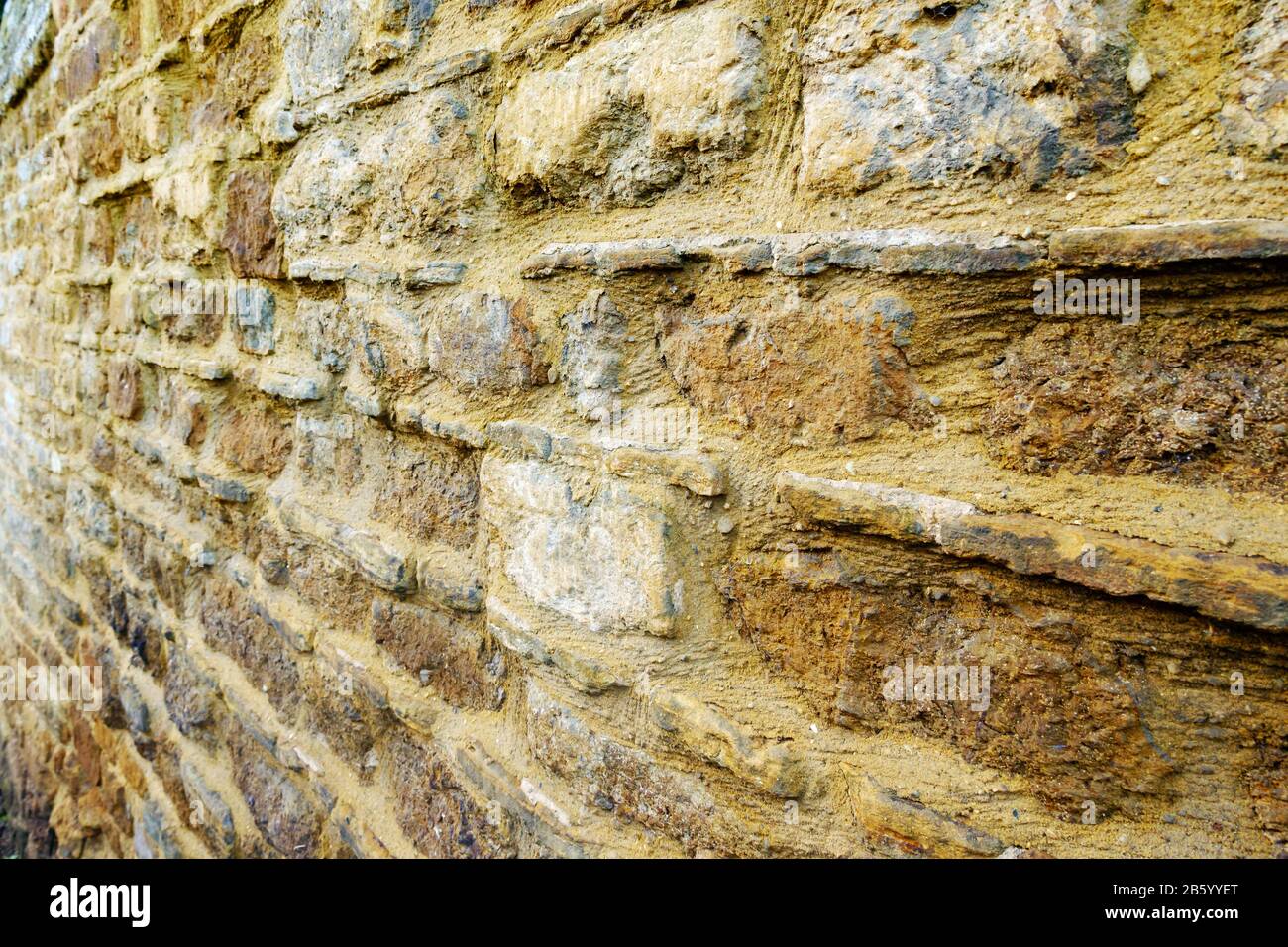 old stone wall building texture in england uk Stock Photo - Alamy