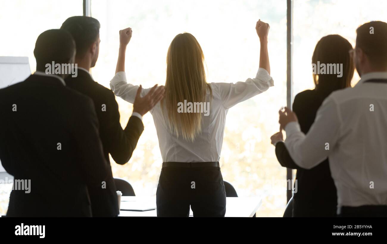 Rear view young colleagues hi-res stock photography and images - Alamy