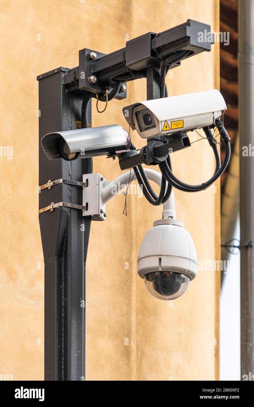 Security CCTV cameras near building Stock Photo - Alamy