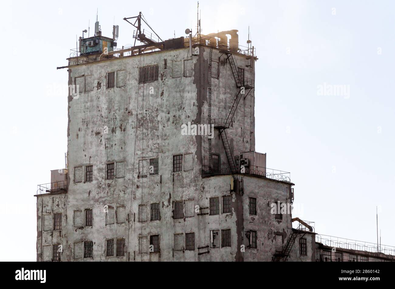 tall old prison building in Ukraine isolated not a light background ...