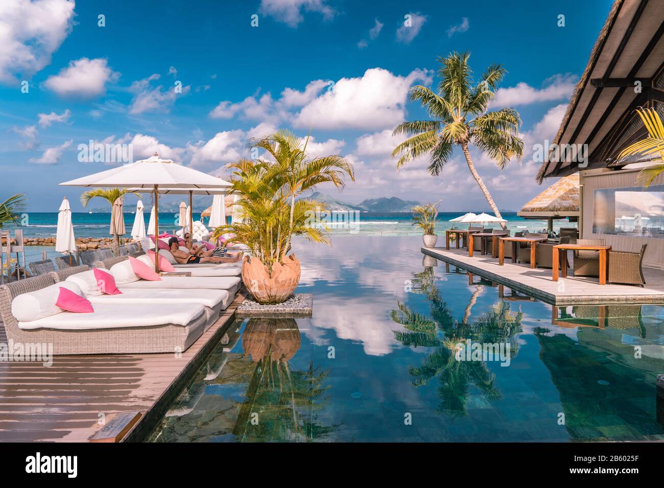 Mahe Seychelles , luxury swimming pool with chairs at the Four Season ...