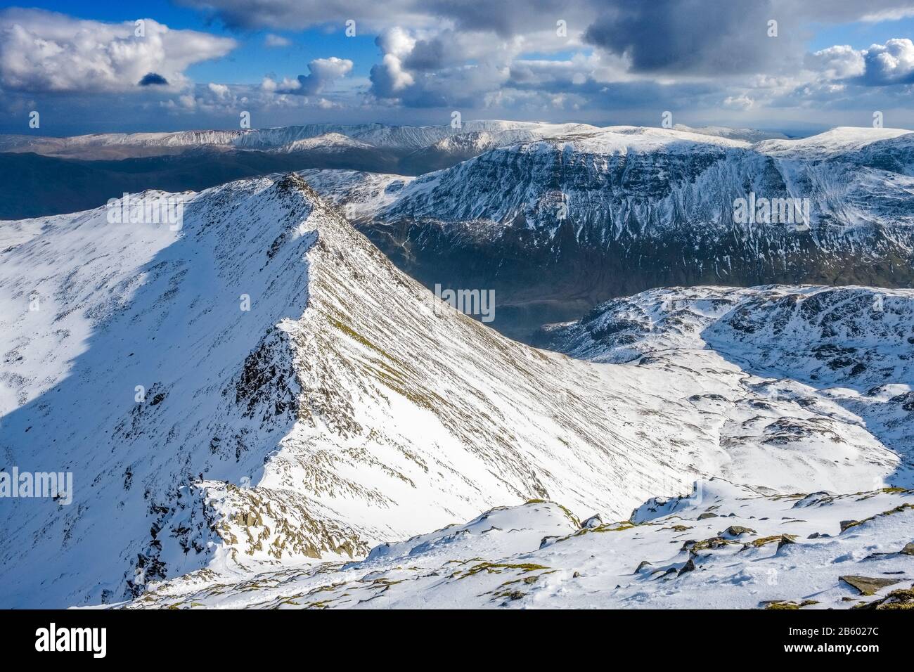 Striding Edge on Helvellyn in winter. The ridge is a popular summer ...