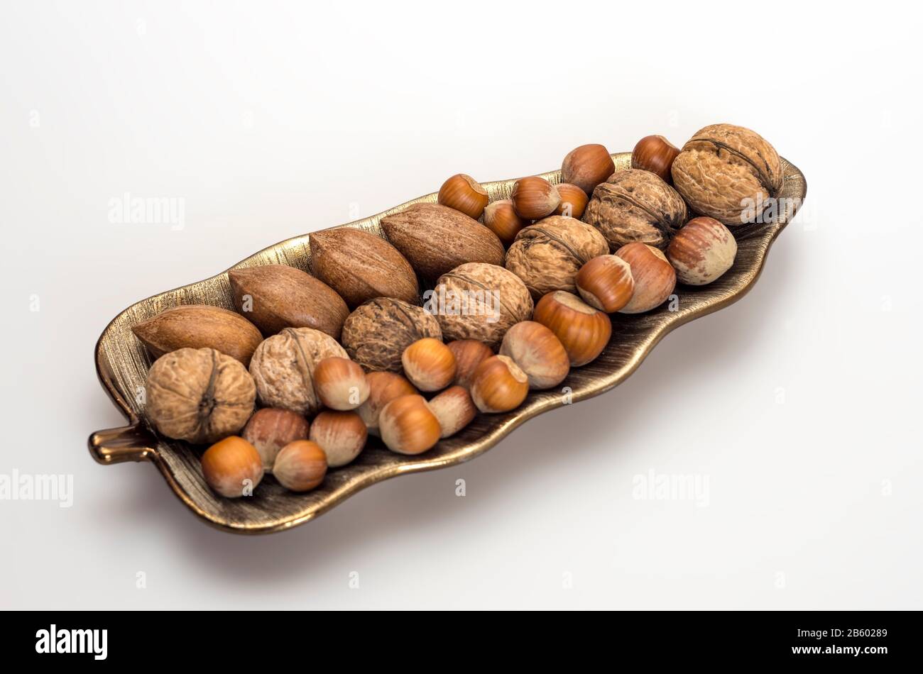 Nuts isolated on white background Stock Photo - Alamy