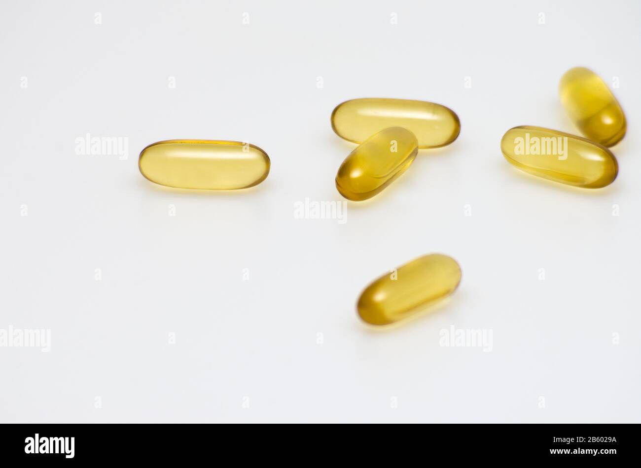 yellow pills isolated on white background, medicine, pharmacy concept ...