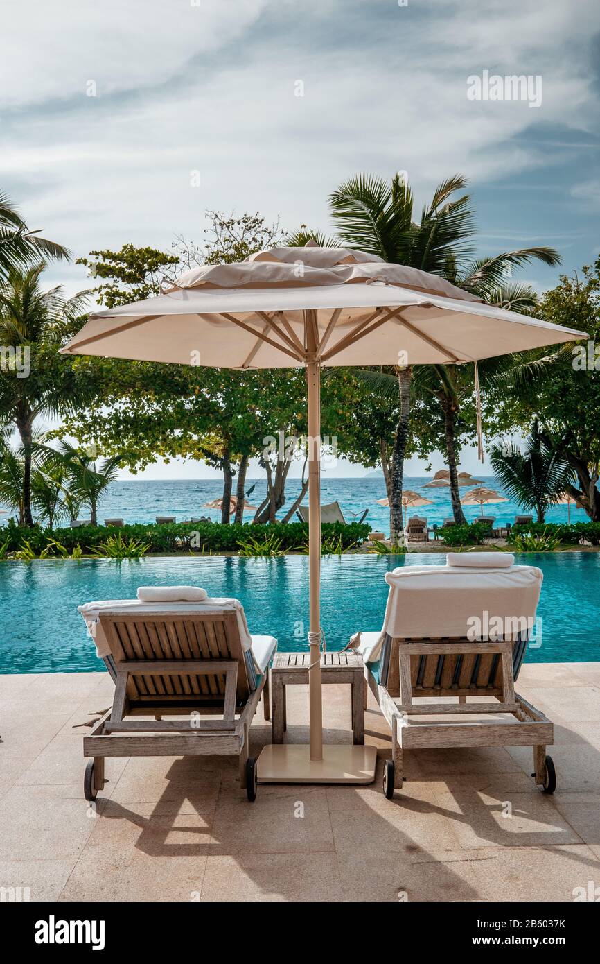 Mahe Seychelles , luxury swimming pool with chairs at the Four Season ...