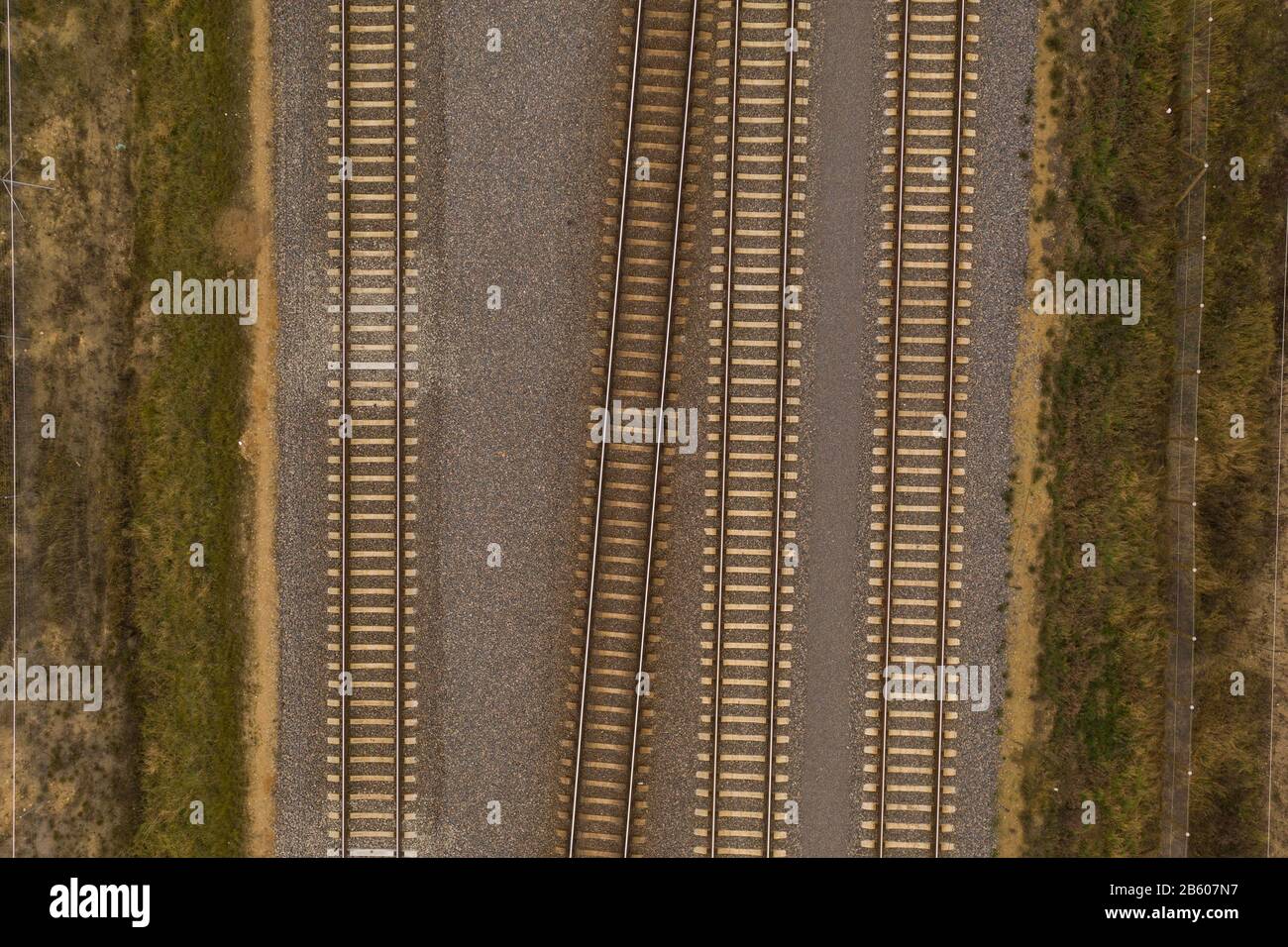 Drone view of train track parallel each one. Directly above Stock Photo ...