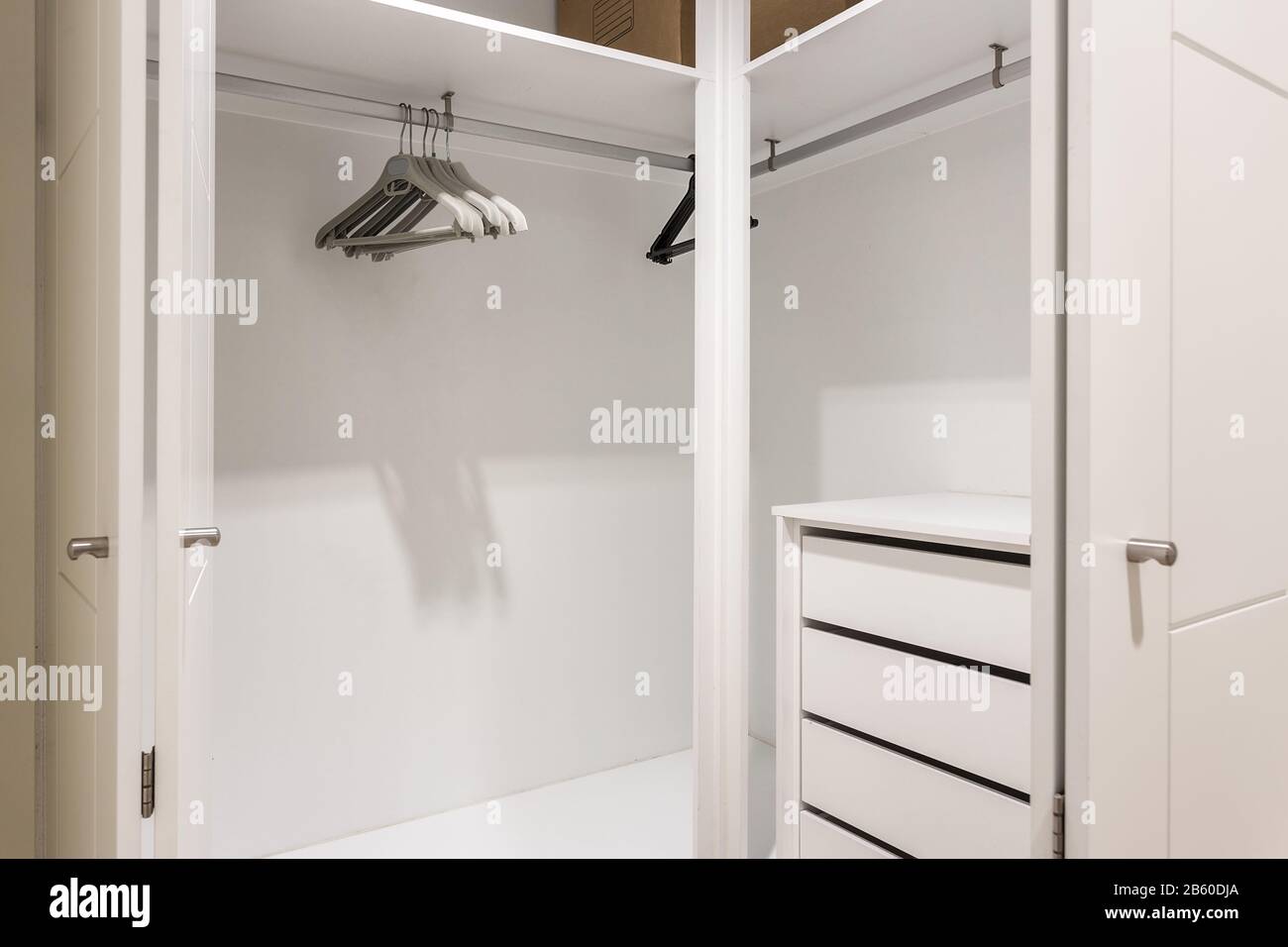 Empty shelves in the closet for clothes. Horizontal format Stock Photo ...