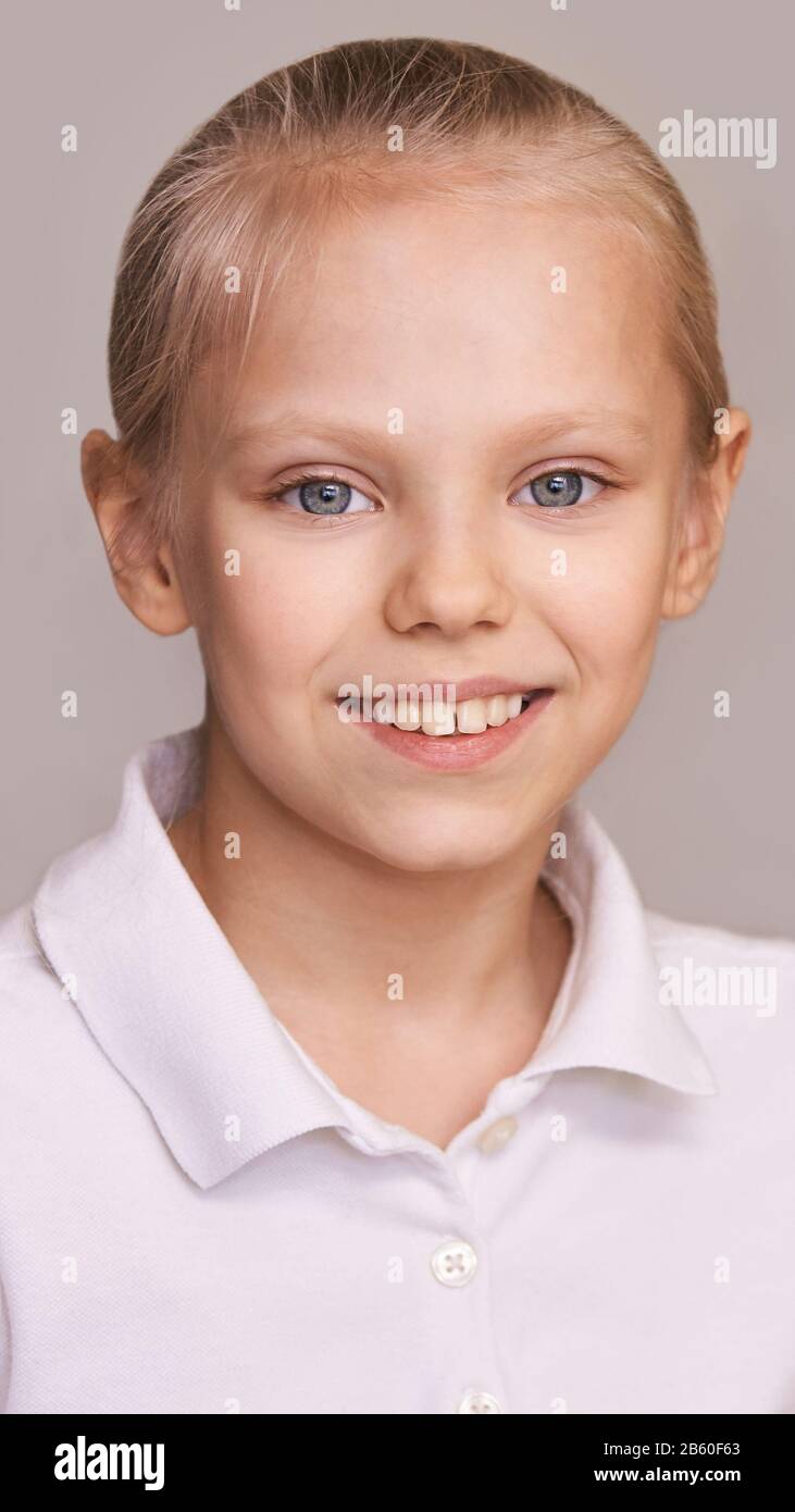 Young beauty girl portrait. Look at camera. Neutral background Stock ...