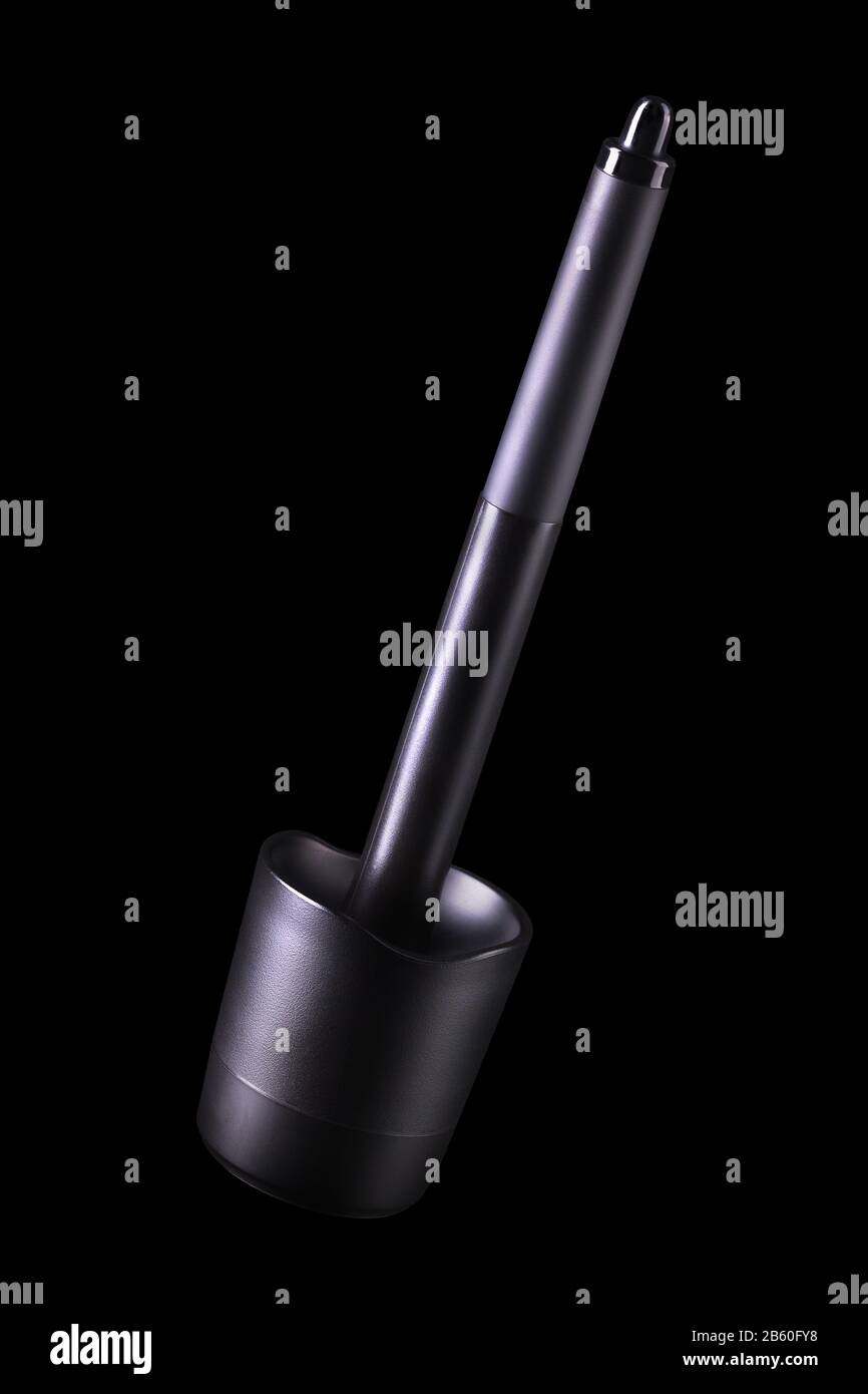 Digital graphic pen with stand isolated on black background with ...