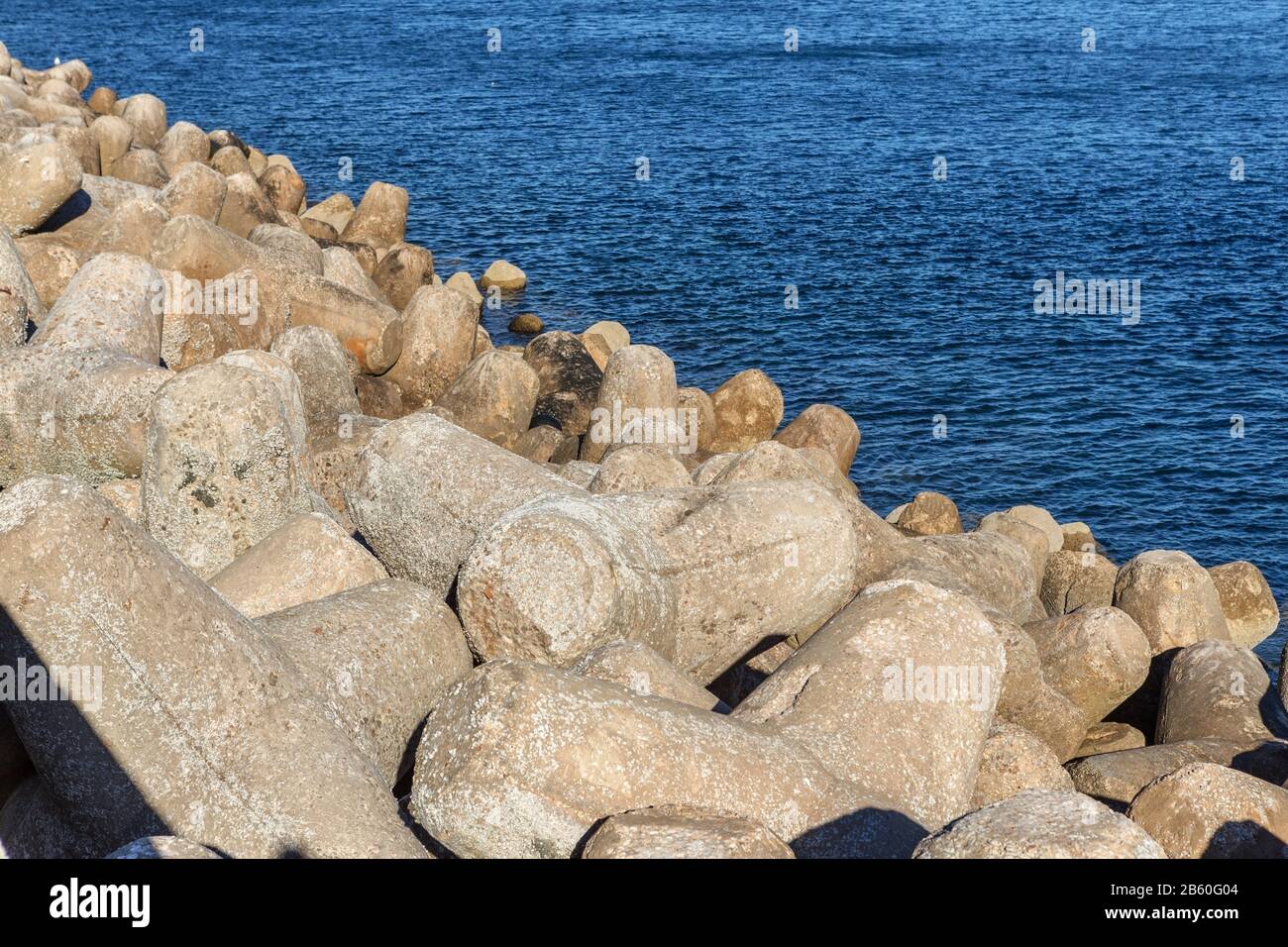 The structure of the breakwater wharf seaport Stock Photo - Alamy