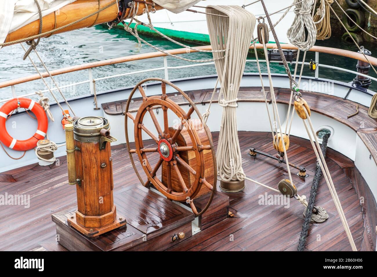 Steering wheel for the captain on an old sailboat Stock Photo - Alamy