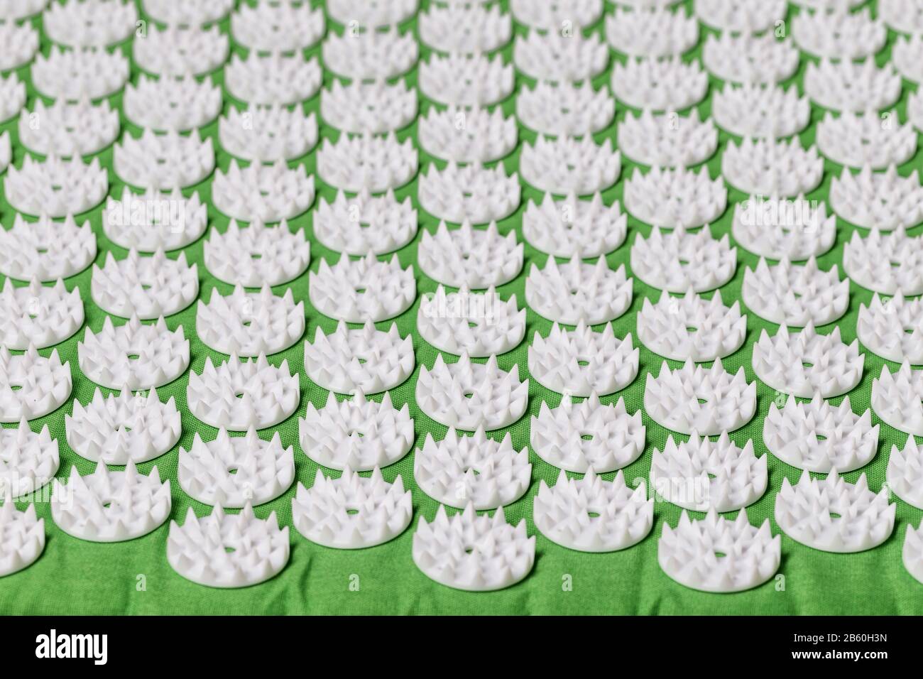 Acupuncture mat for treatment in orthopedics. For the spine Stock Photo ...