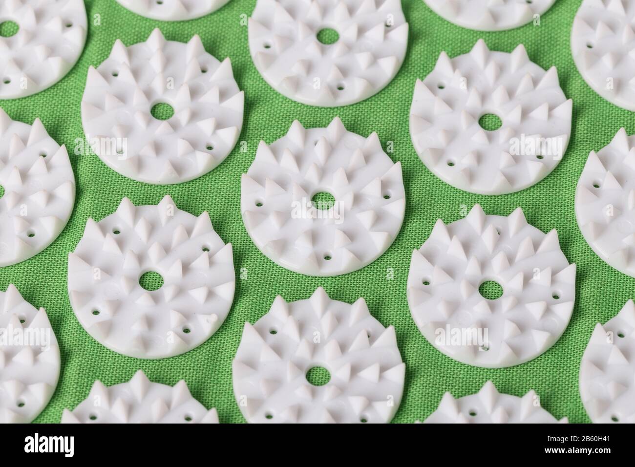 Acupuncture mat for treatment in orthopedics. For the spine, close up ...